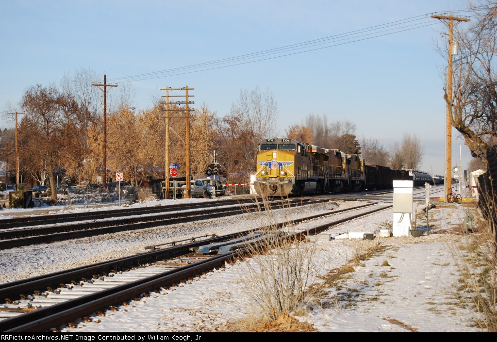 UP 5338 heads south right into the sun